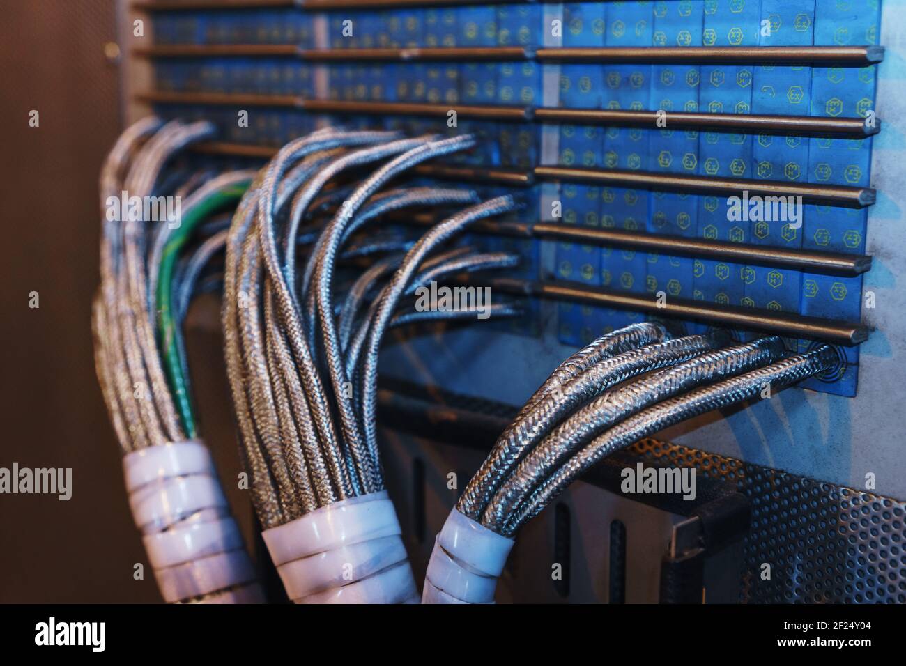 Technological wires in a metal sheath are laid in a cable channel to ...