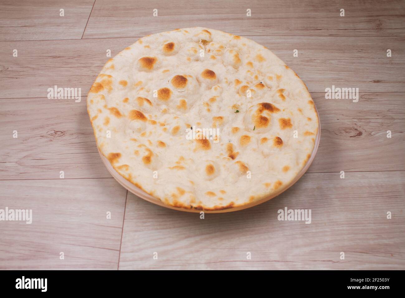 Tandoori roti hi-res stock photography and images - Alamy