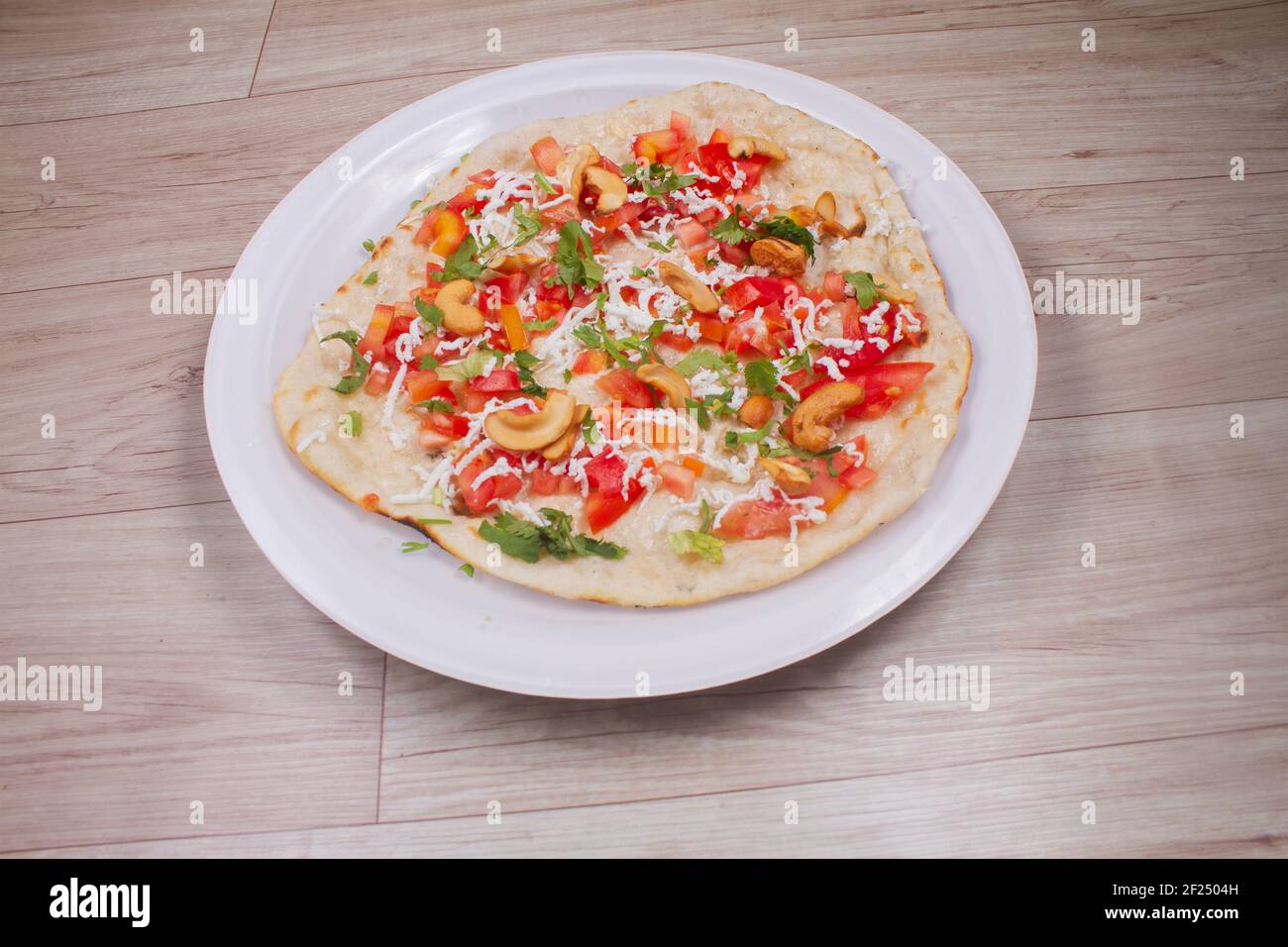 Uthappam or Uttapam is a type of dosa from southern India that is ...