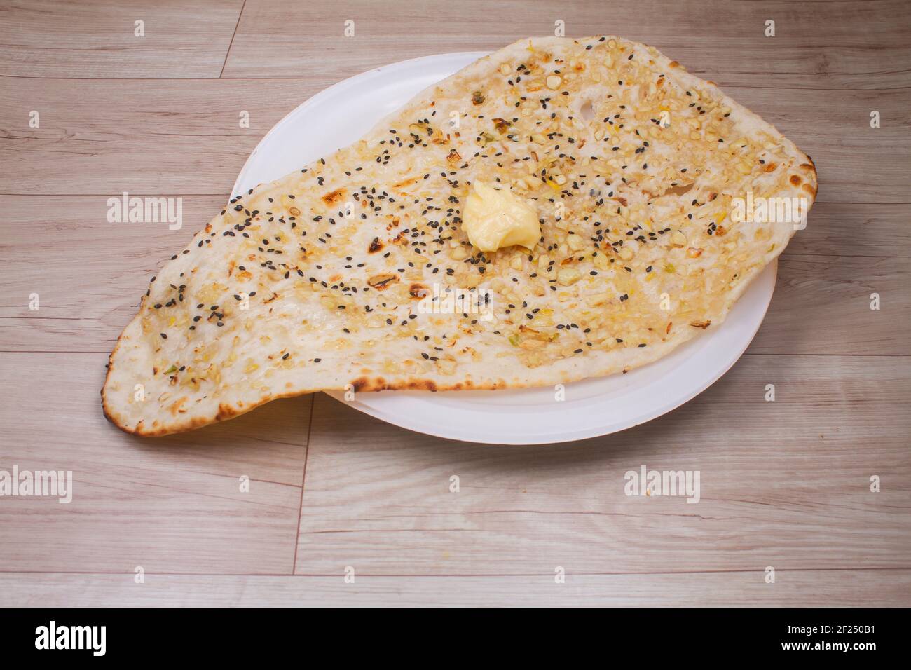 Fresh and hanging bread on gray cement background with copy space. Top ...