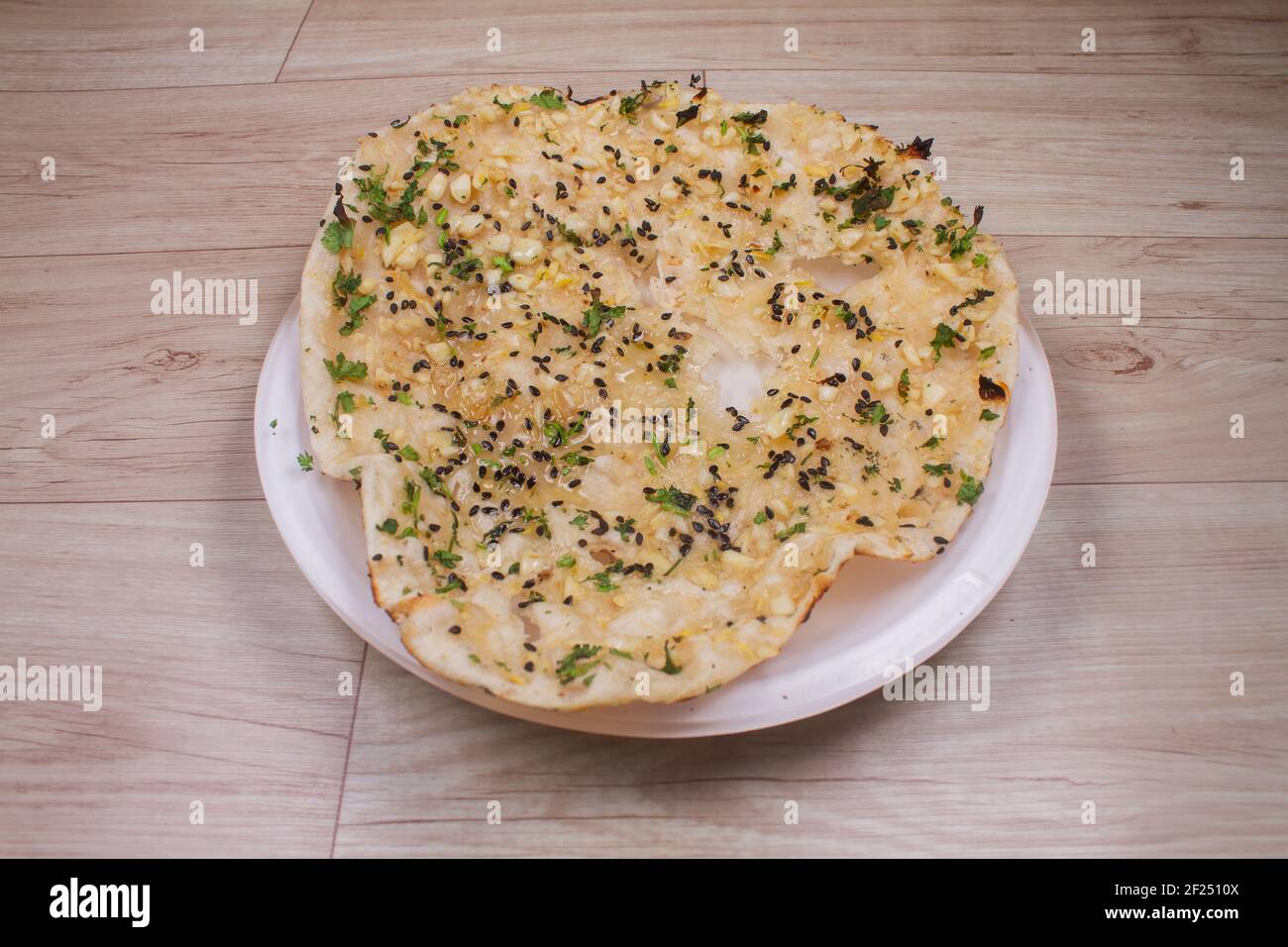 Tandoori roti hi-res stock photography and images - Alamy