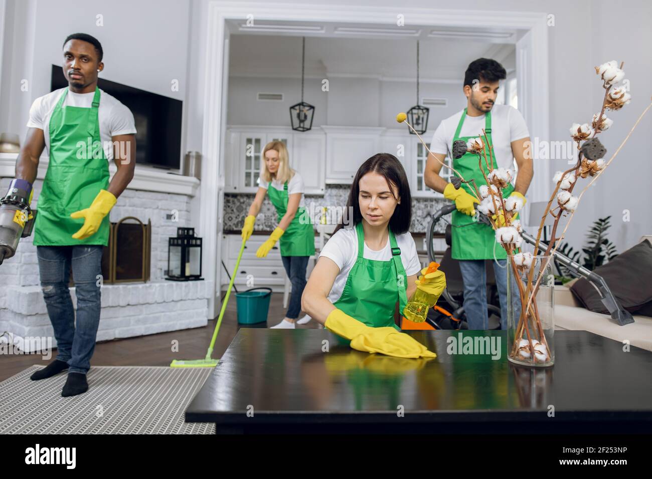 Group of multiracial people professional cleaning of room Stock Photo ...