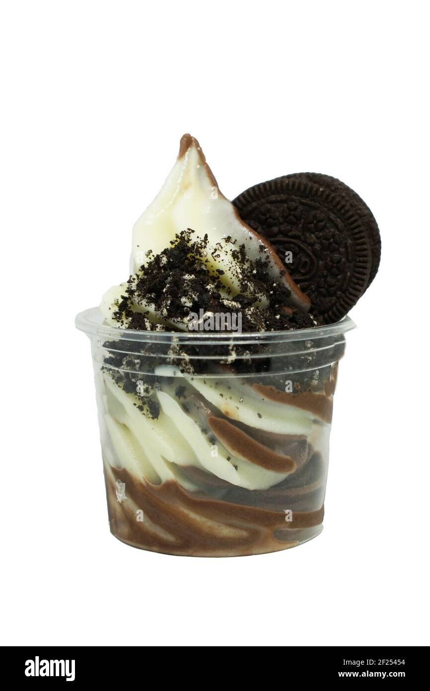 soft serve ice cream in a cup with topping Stock Photo - Alamy
