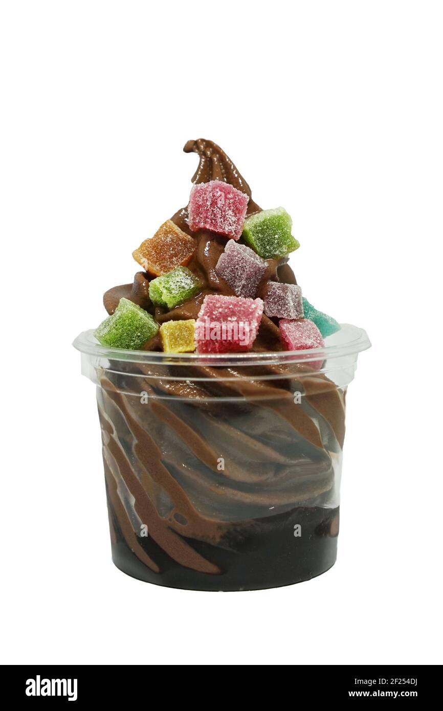 soft serve ice cream in a cup with topping Stock Photo - Alamy