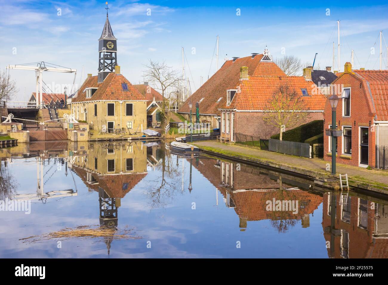Lock building with clock tower in historic city Hindeloopen ...