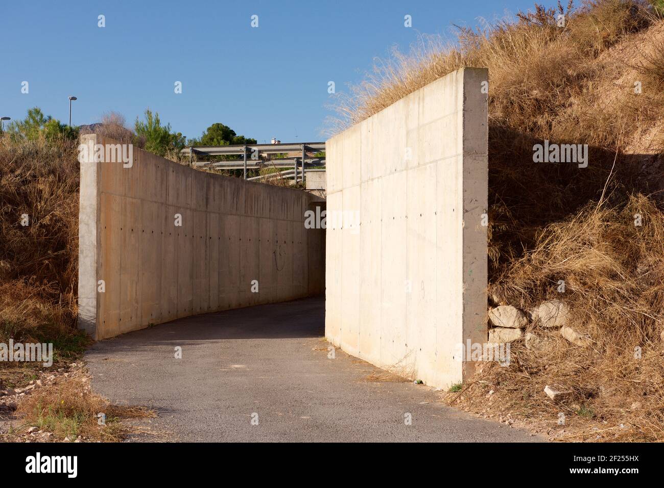 Concrete walls underpass on a country road Stock Photo - Alamy