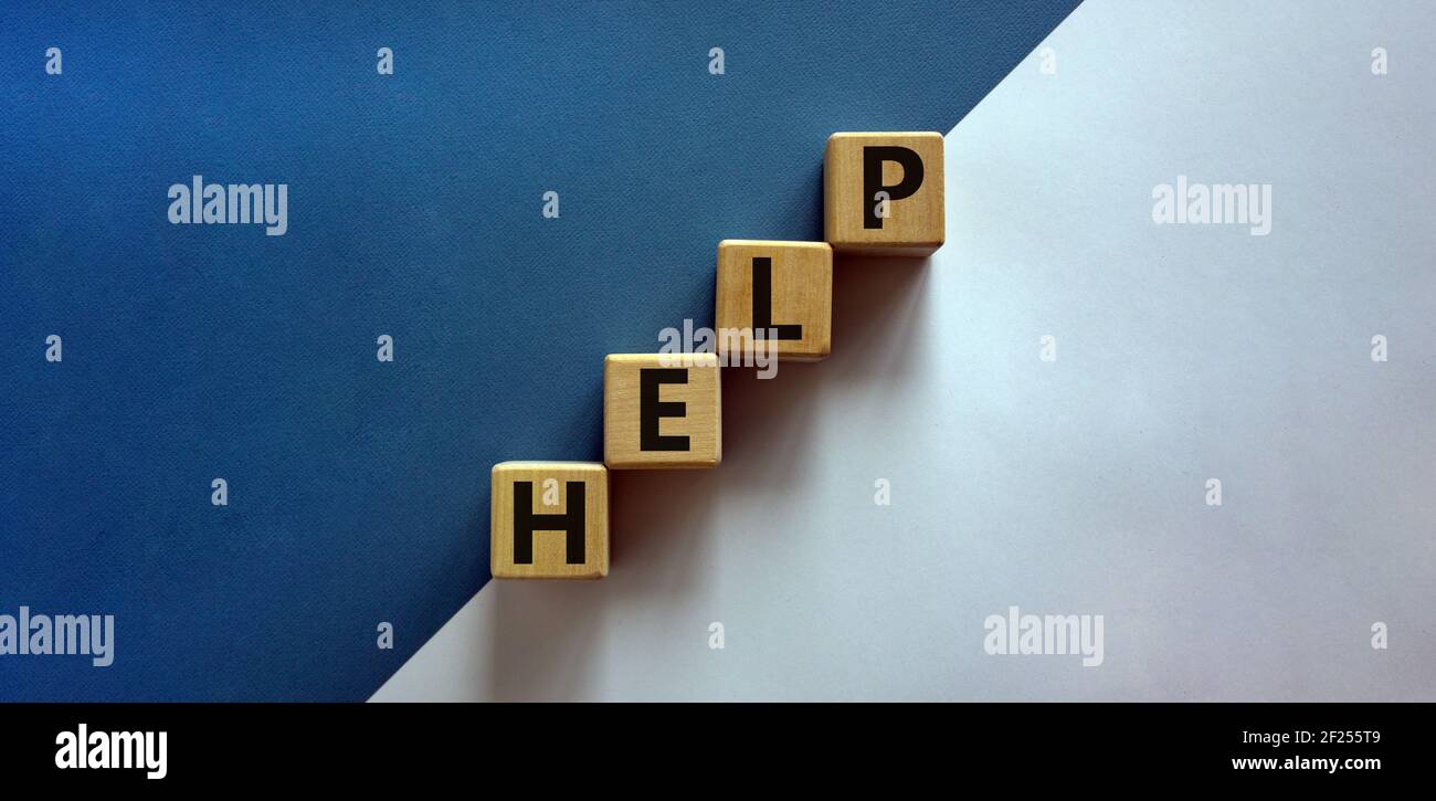 Support and help symbol. Wooden cubes with the word 'help'. Business ...