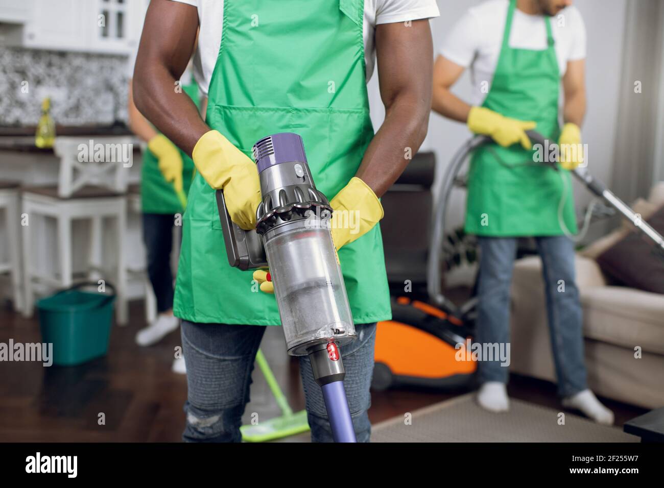 Multiracial team cleaning service hi-res stock photography and images ...