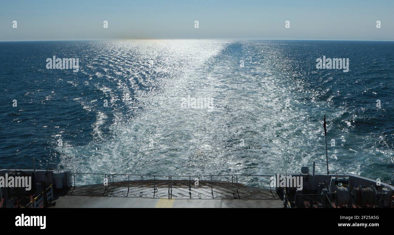 Back view of the sea and sun from a ferry Stock Photo - Alamy