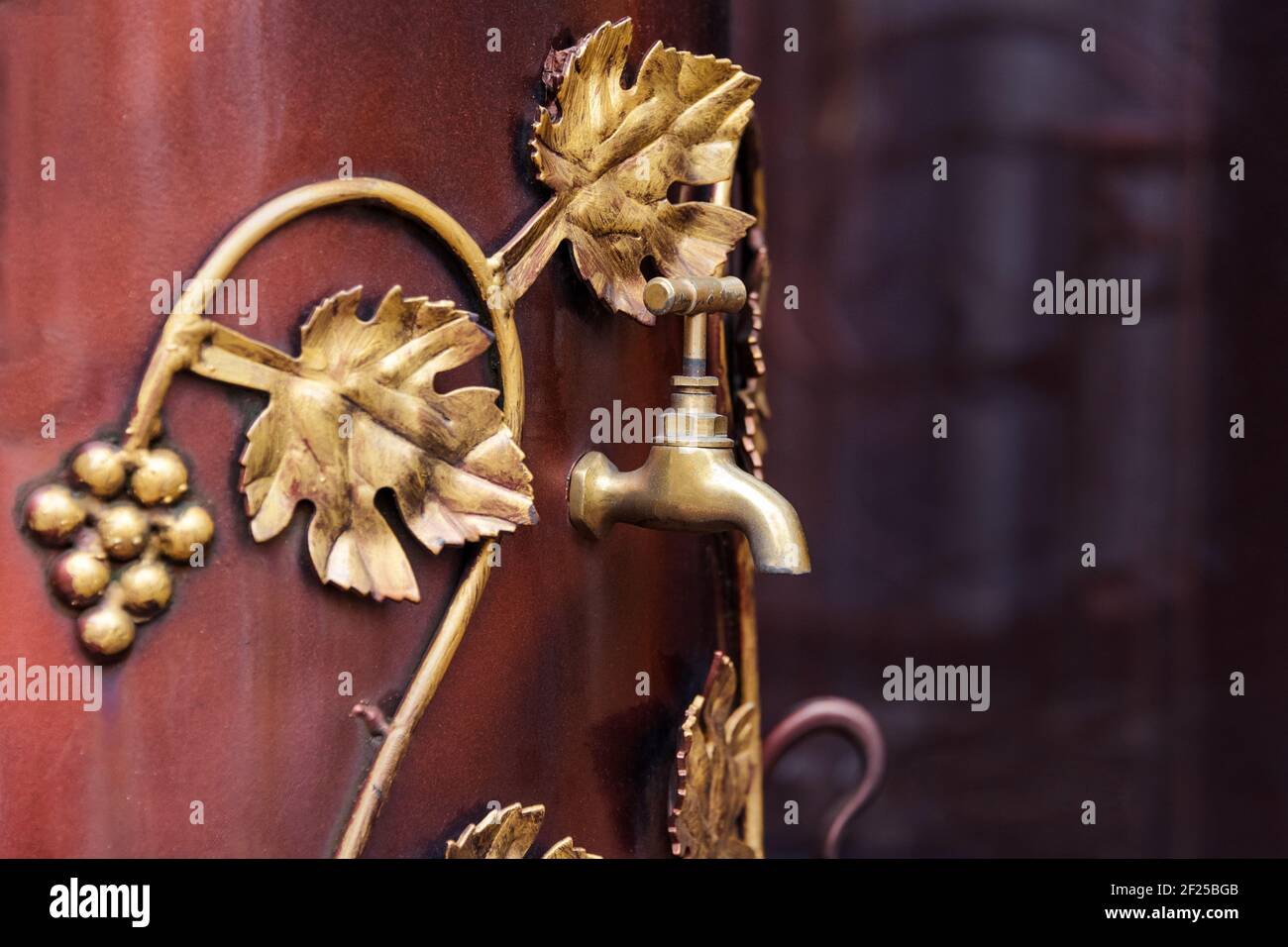 Metal barrel with a tap for wine. Retro style barrel for storing and ...