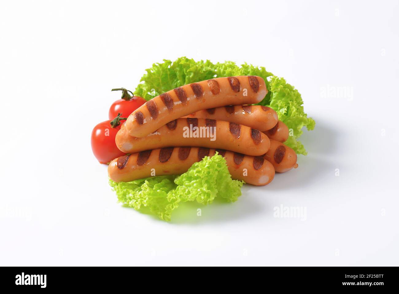 Grilled mini Vienna sausages - studio shot Stock Photo - Alamy