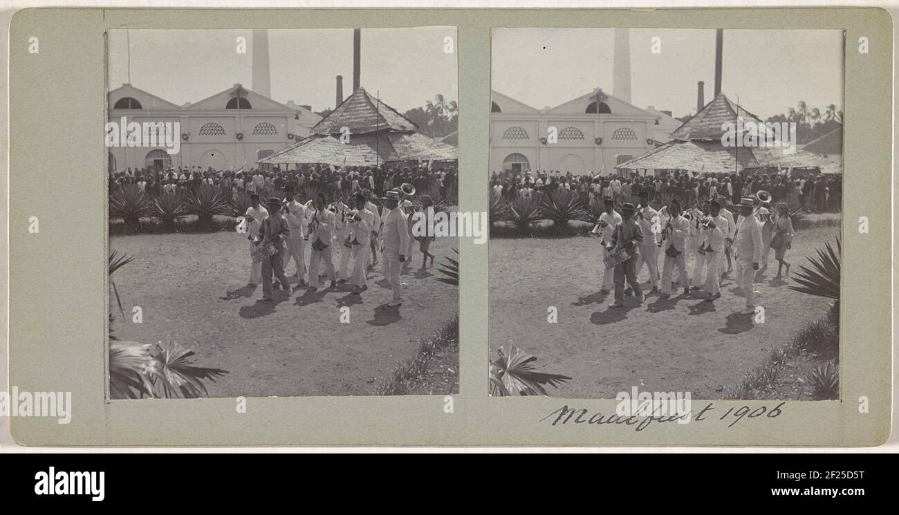 Group of men playing on instruments during the milling Stock Photo - Alamy