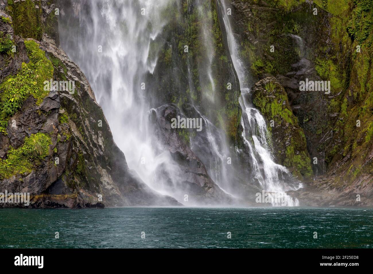 Waterfall at Milford Sound Stock Photo - Alamy