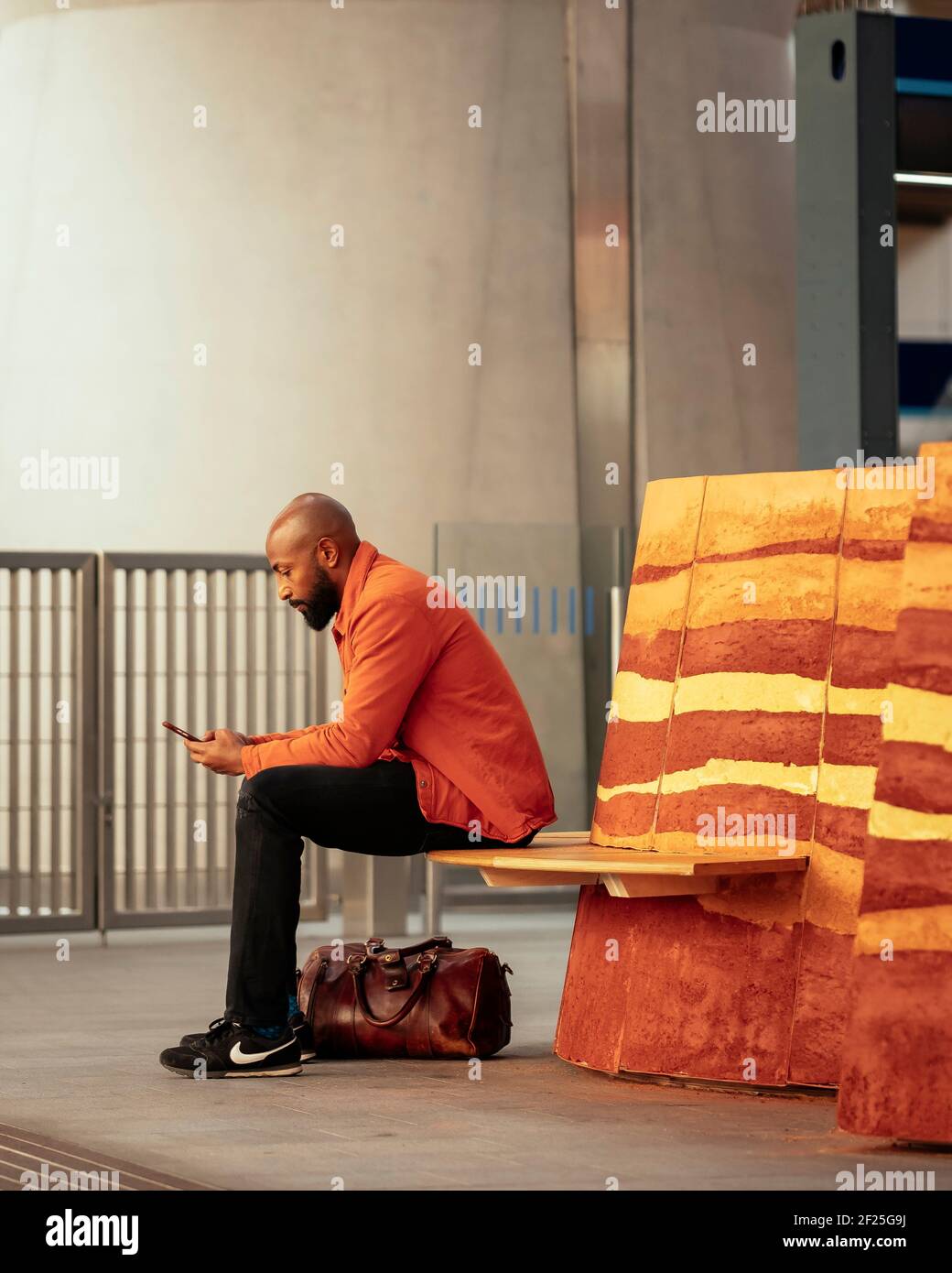 Man sitting on bench. Sitting on Londons Clay, London, United Kingdom ...
