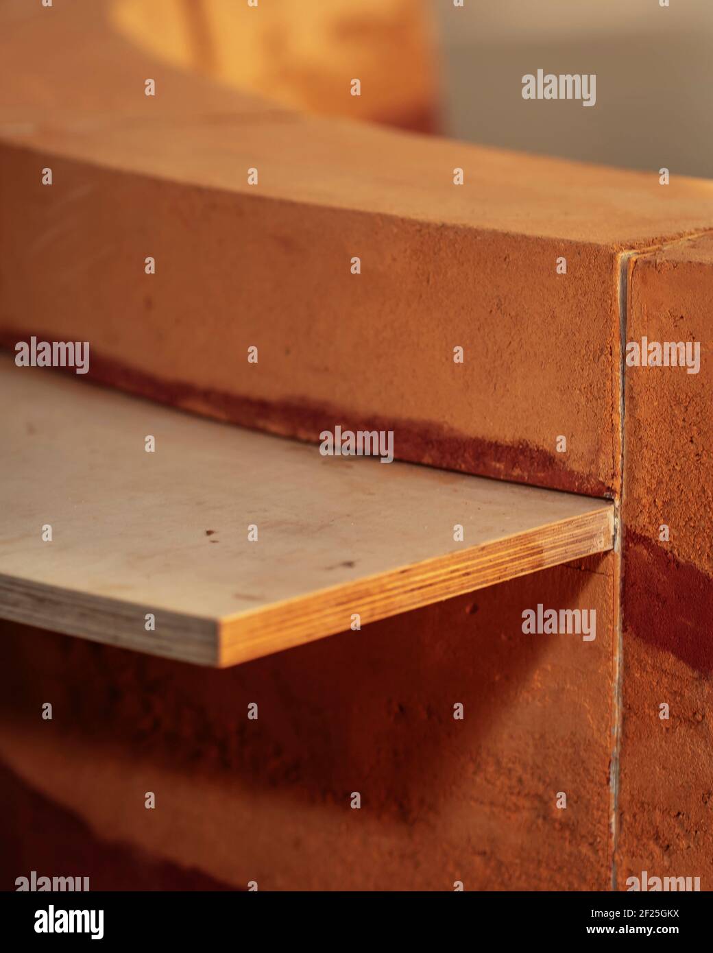 Detail of the materials the bench is made of, with shadows and sunlight ...