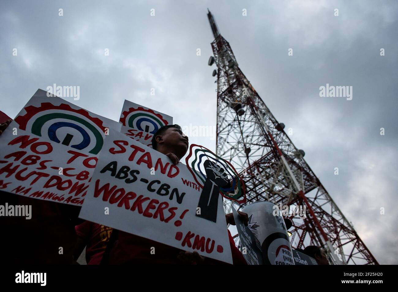 Filipino activists hold placards during hi-res stock photography and ...