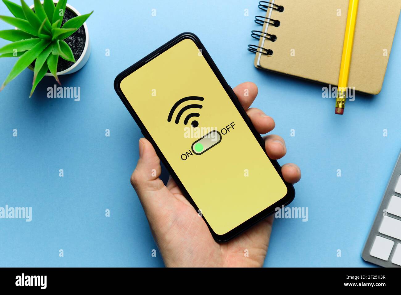 Wi-Fi mode enabled concept with smartphone in person hand Stock Photo ...