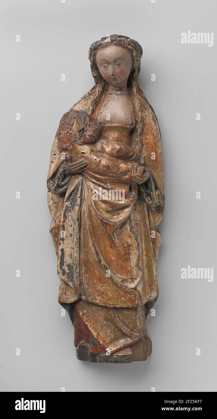 Maria met kind.On a soil is Maria with a curved left leg. She is ...