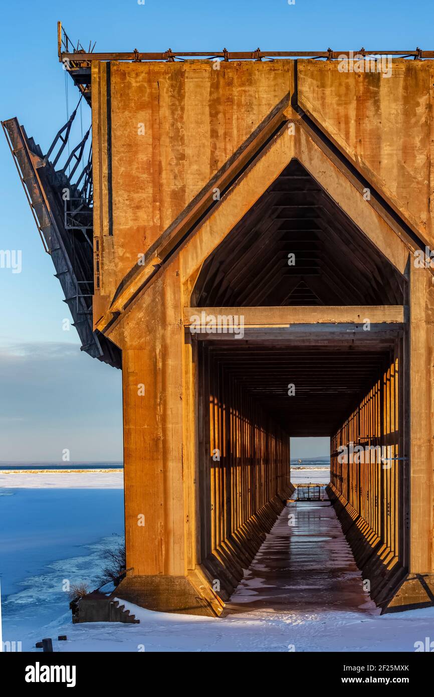 Lower Harbor Ore Dock, abandoned in 1971, in February in Marquette ...