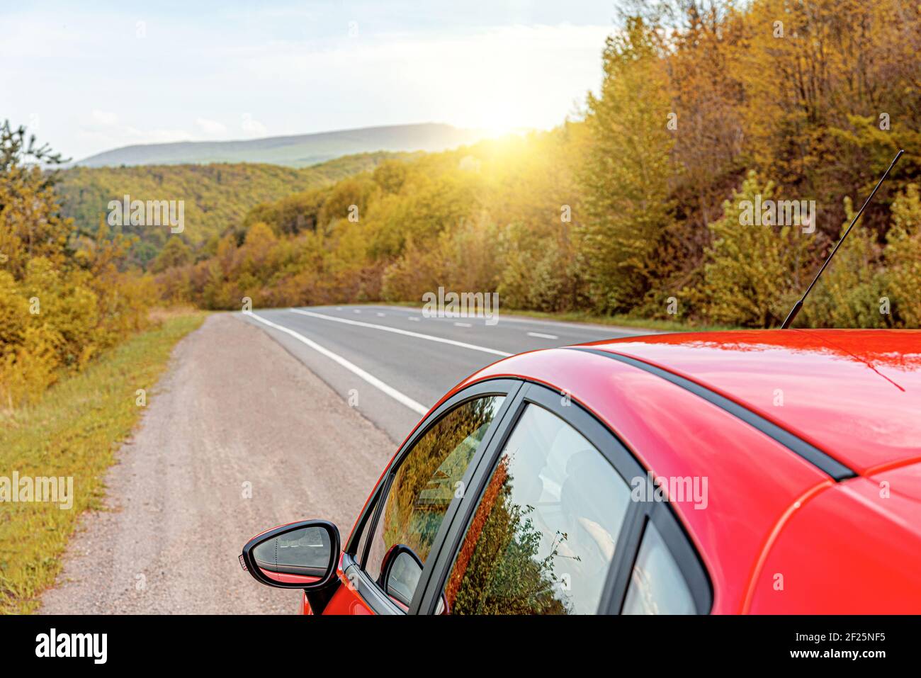 Red car on the side of the highway Stock Photo - Alamy