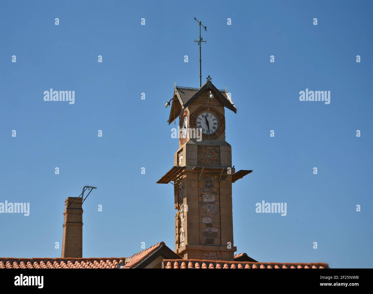 Stone clock tower, a historic landmark of Lavrion in Attica, Greece ...