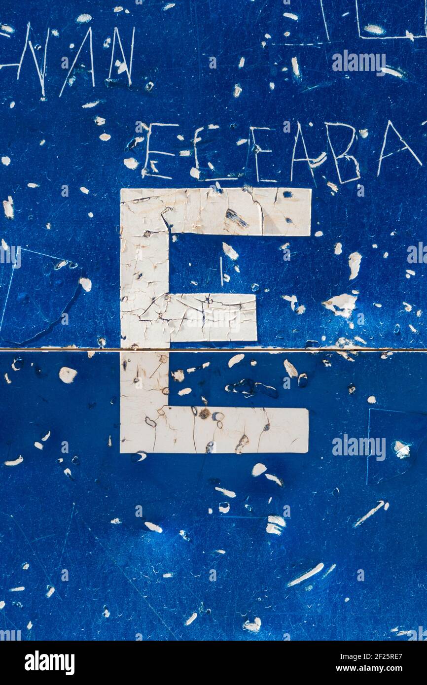 White letter E on a blue traffic sign Stock Photo - Alamy