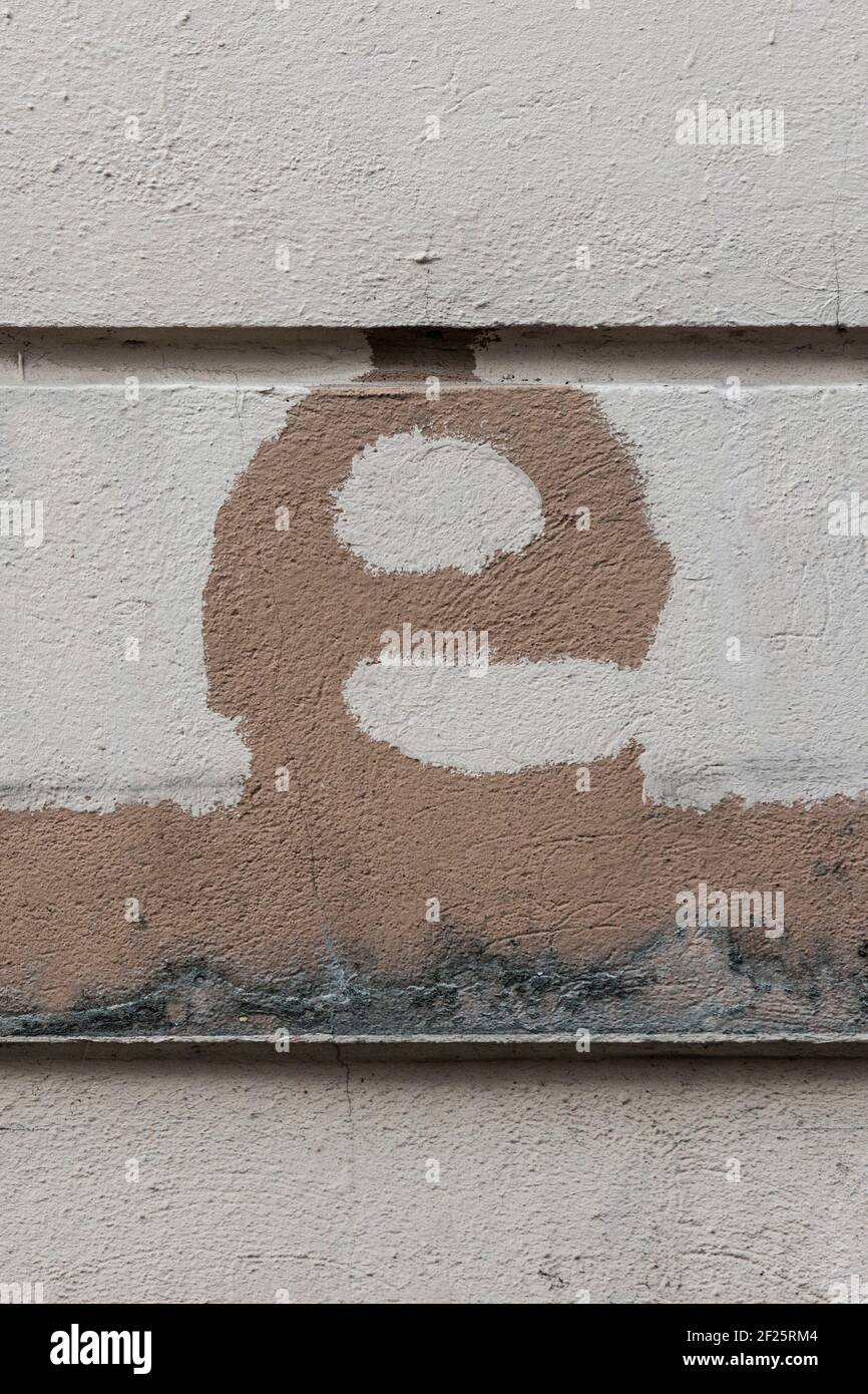 Colour remnants of a disappeared letter e Stock Photo - Alamy