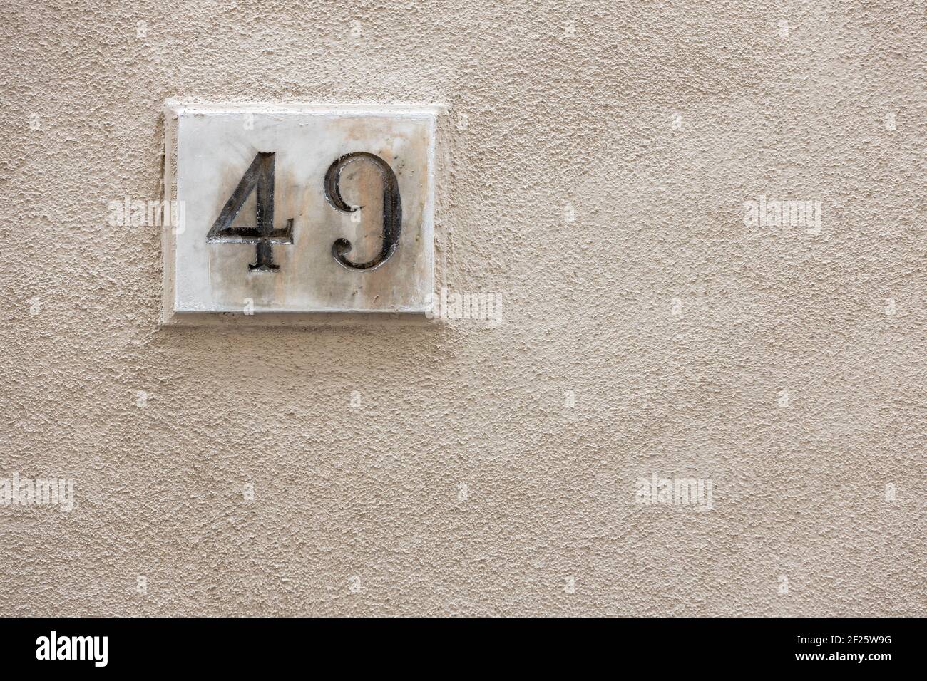 49 ancient house number, concept number Stock Photo - Alamy