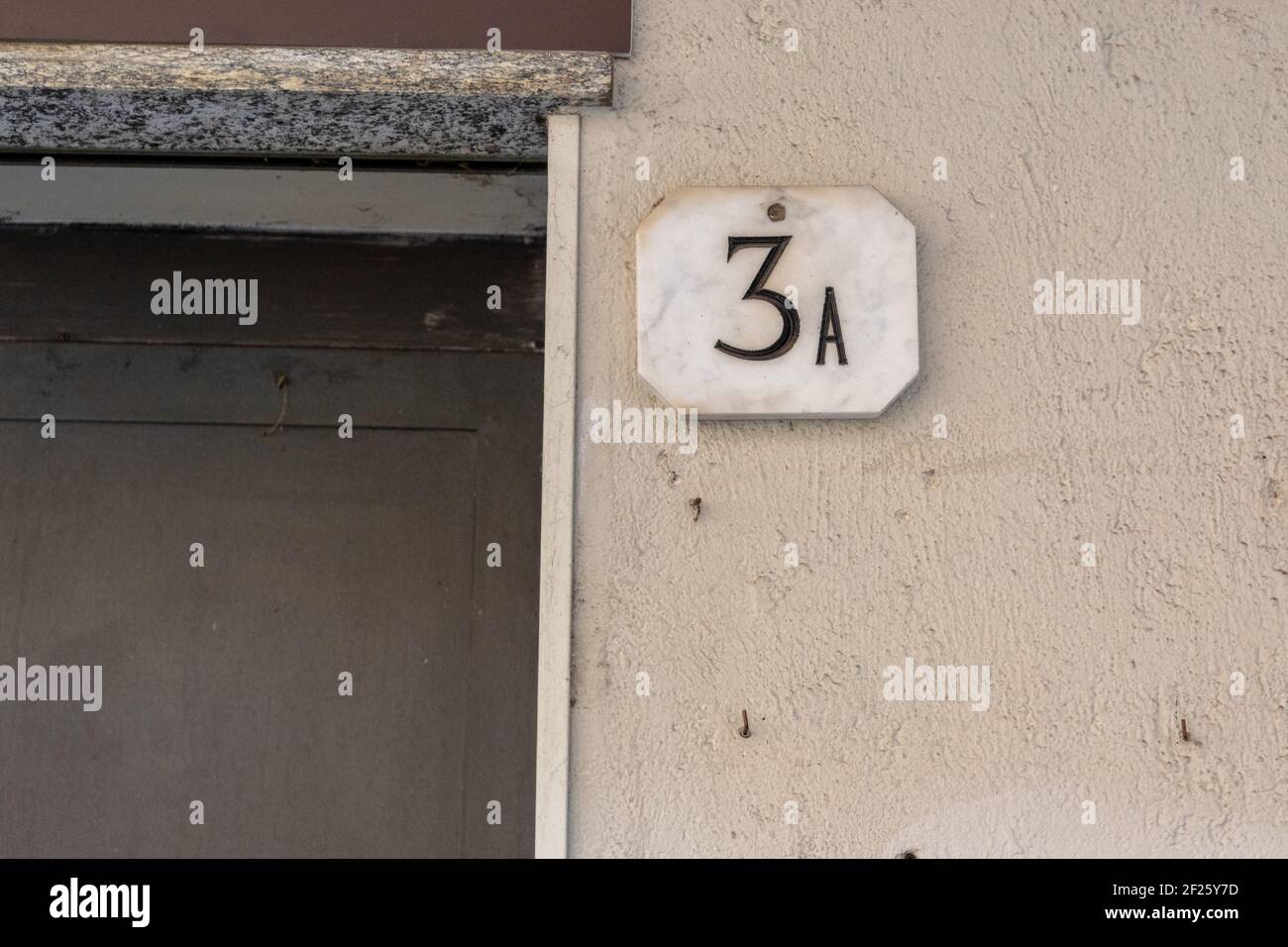 3 A ancient house number, concept number Stock Photo - Alamy