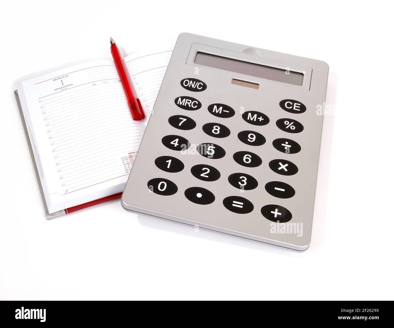 Great calculator and notebook for reference daily notes with a pen on a ...