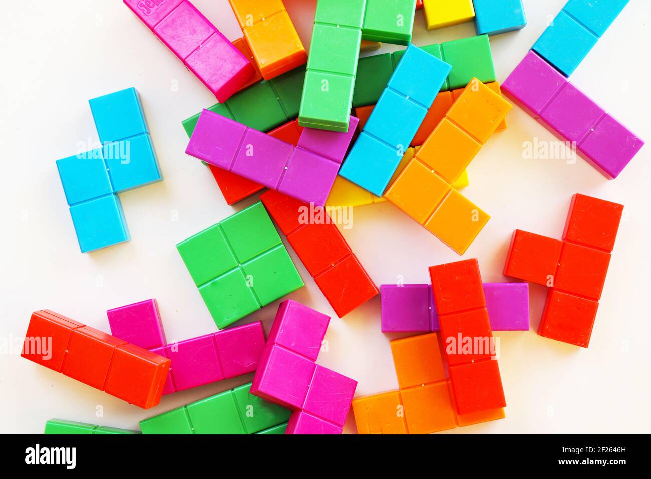 A colorful puzzle cubes, geometric figures, or table game, isolated on ...