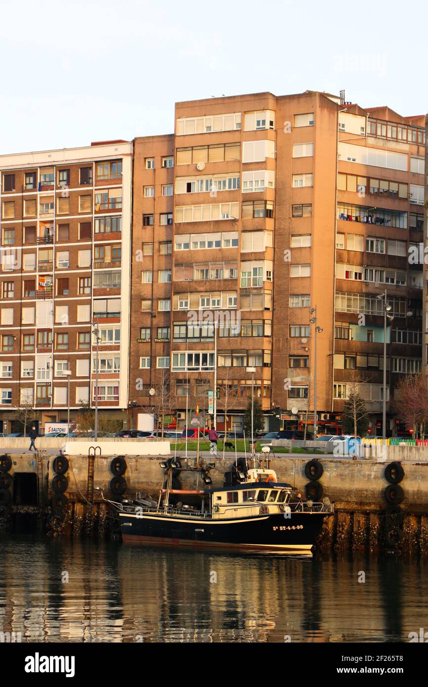 Spanish fishing boat moored at low tide in the Maliano Dock Santander ...