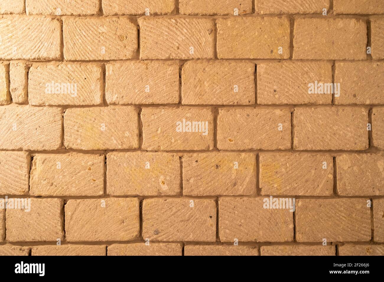 wall built of stone blocks of tuff Stock Photo - Alamy