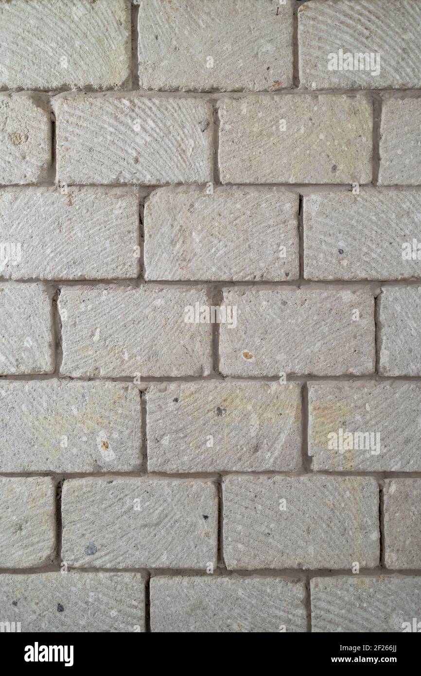 wall built of stone blocks of tuff Stock Photo - Alamy