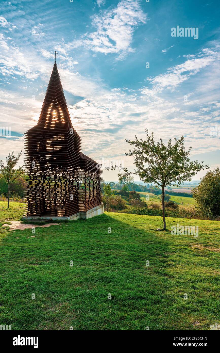 See-through steel church in Borgloon at sunset, Belgium Stock Photo - Alamy