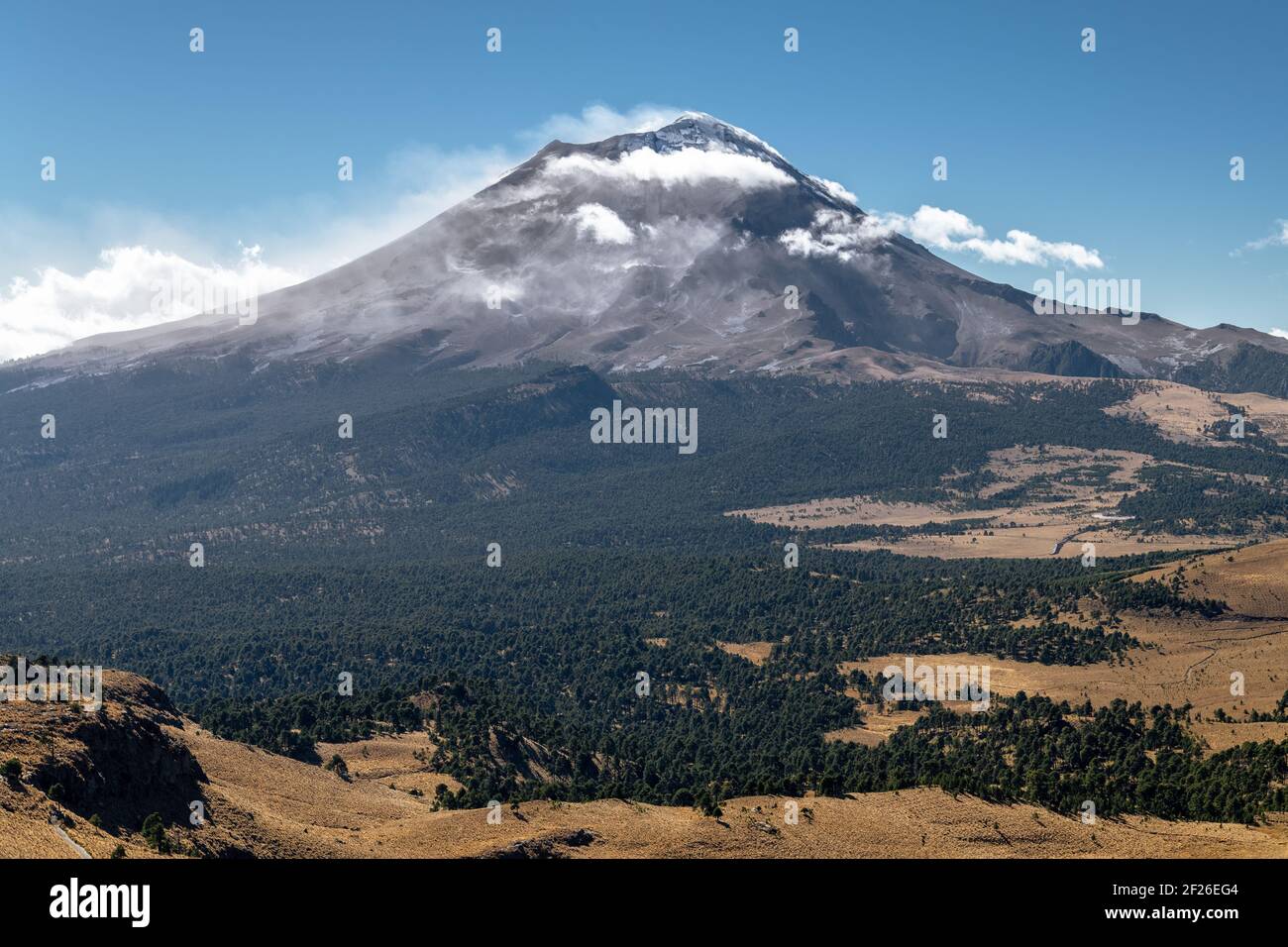 Popocatépetl Volcano in Mexico with clouds and blue sky at a sunny ...