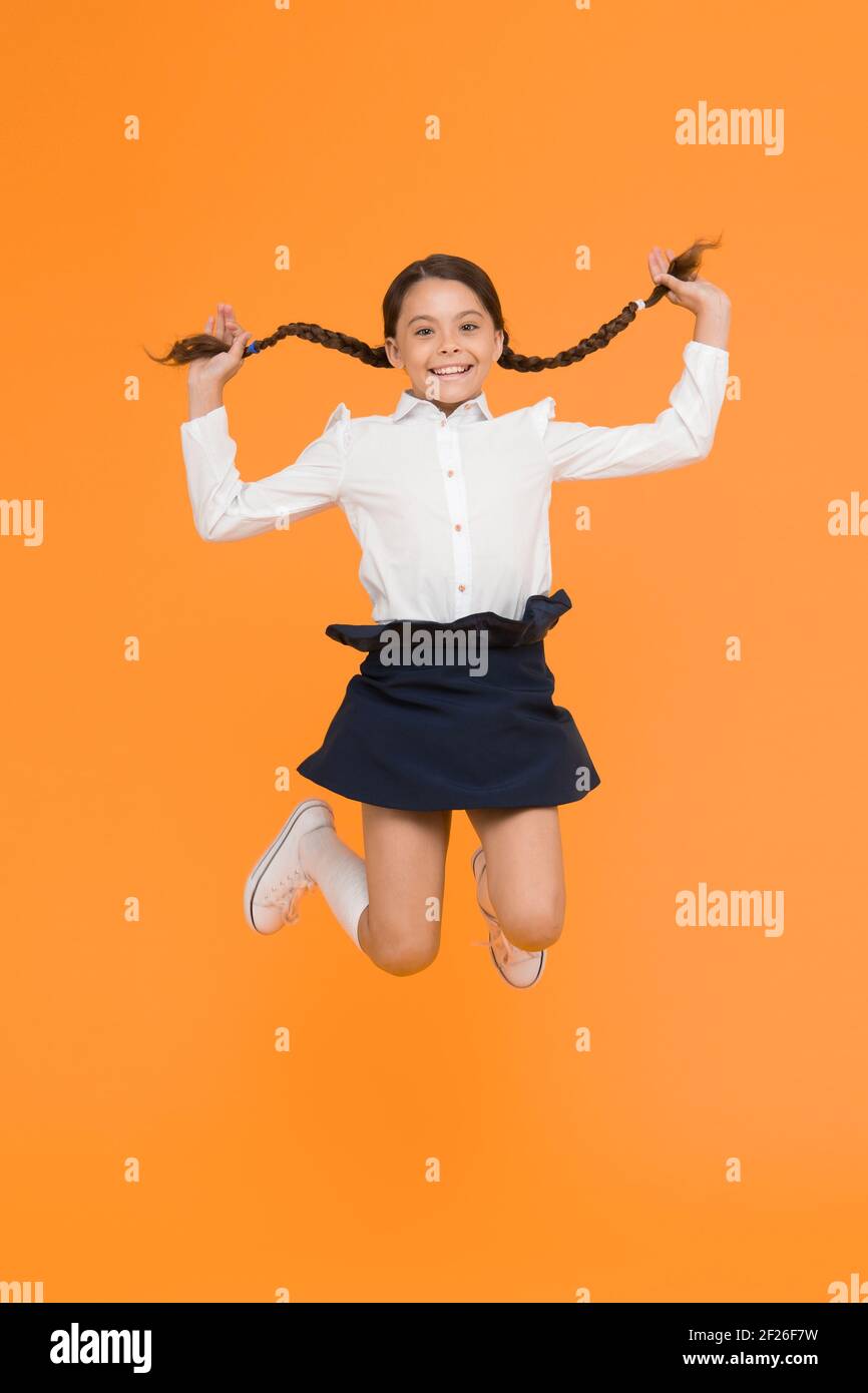 happy child jumping in school uniform. having fun. time for fun. school ...