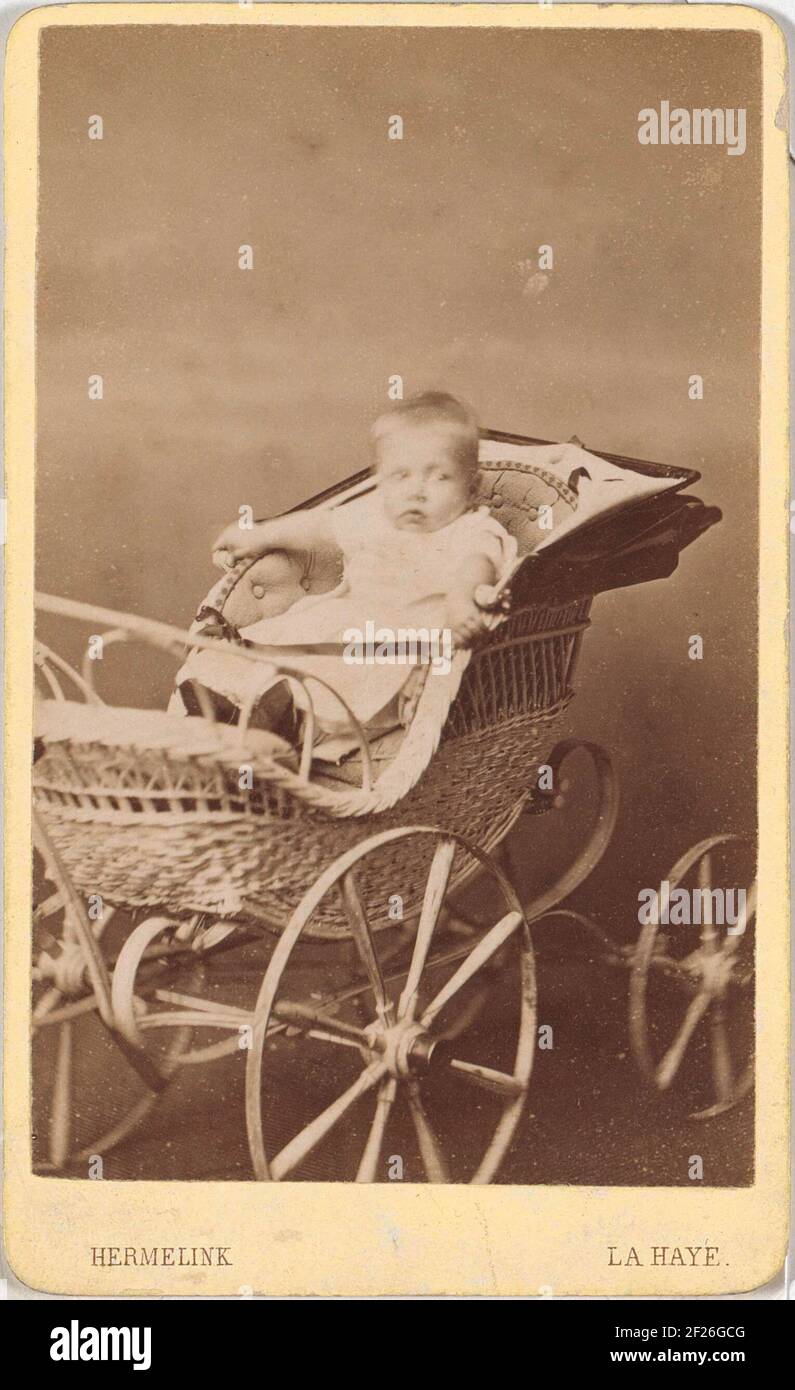 Portrait of a baby in a pram Stock Photo - Alamy