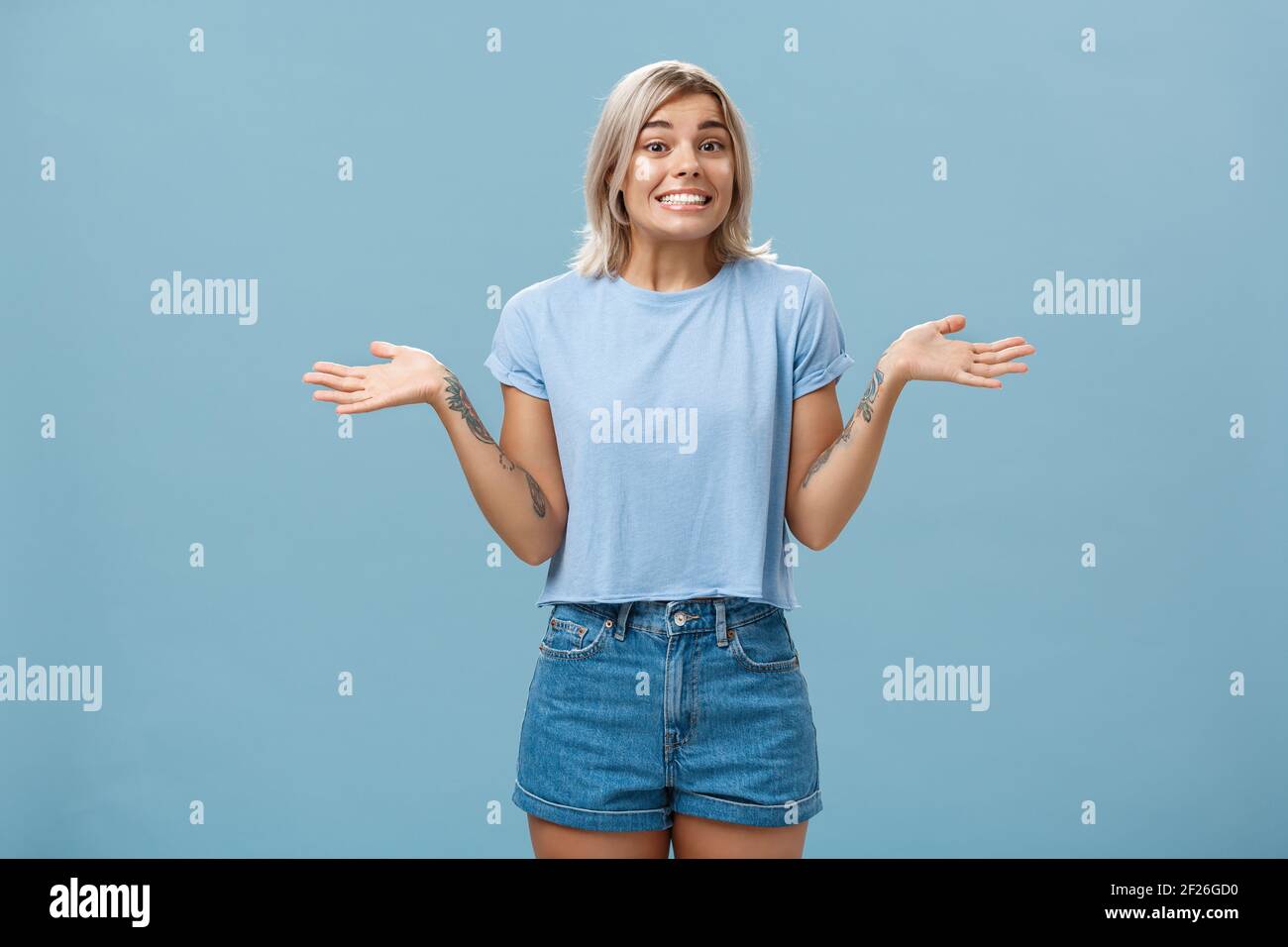 Oops I do not know. Silly cute european girl with fair hair and cool ...