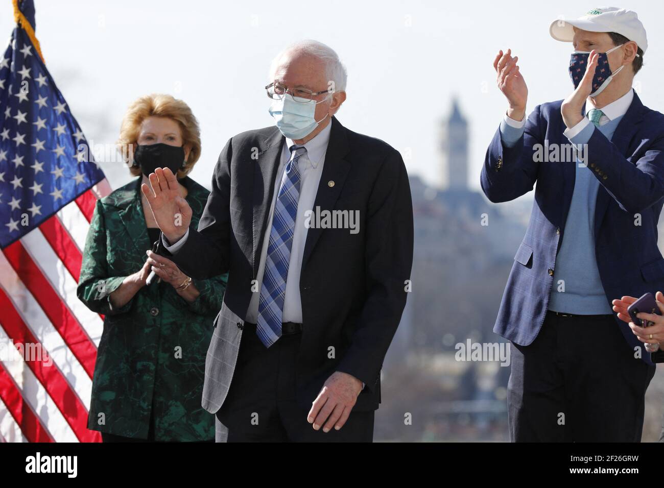 U.S. Senator Bernie Sanders (I-VT) is greeted during a signing ceremony ...