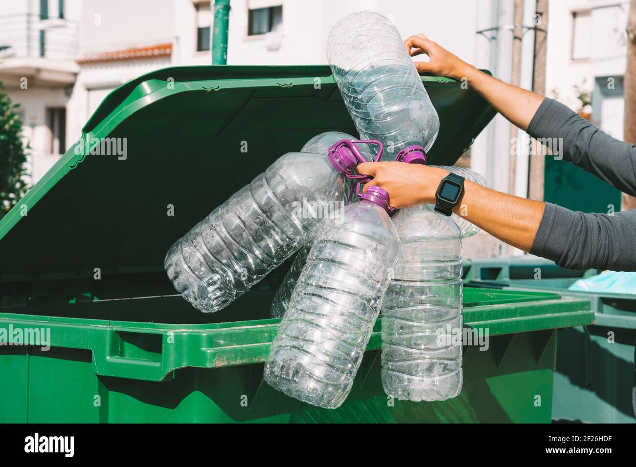 Man is throwing out bottles hi-res stock photography and images - Alamy