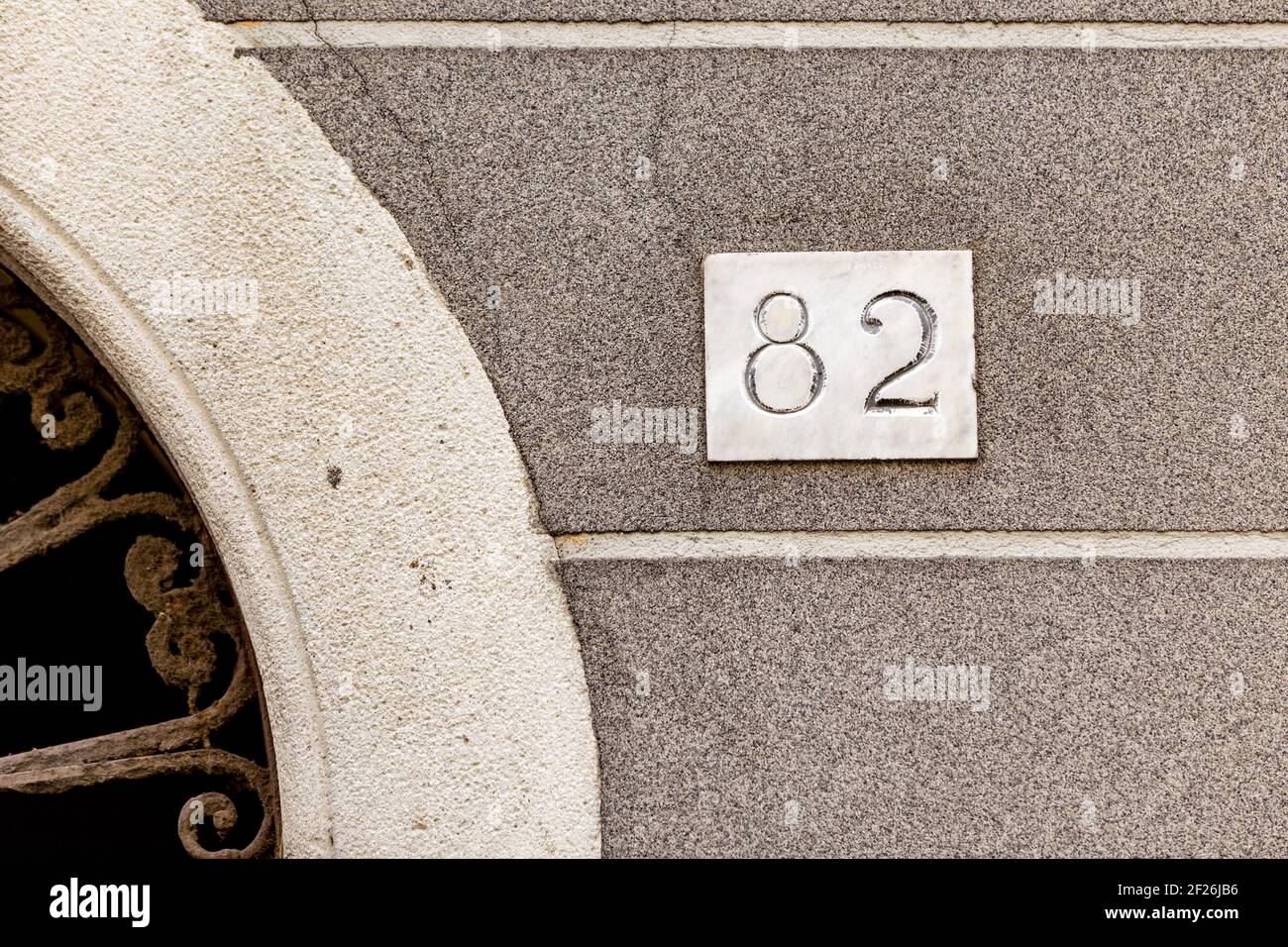 82 ancient house number, concept number Stock Photo - Alamy