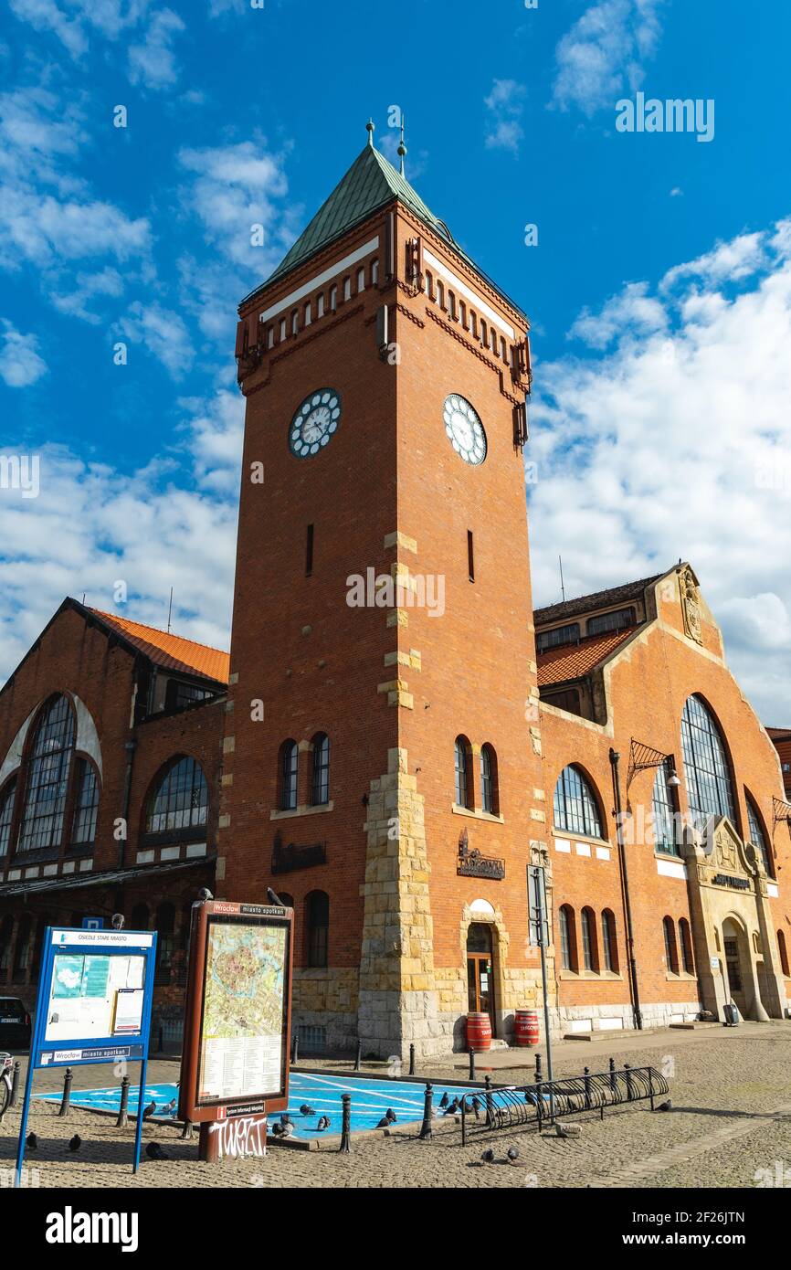 Wroclaw, Poland - May 3 2020: Clock tower of market hall Stock Photo ...