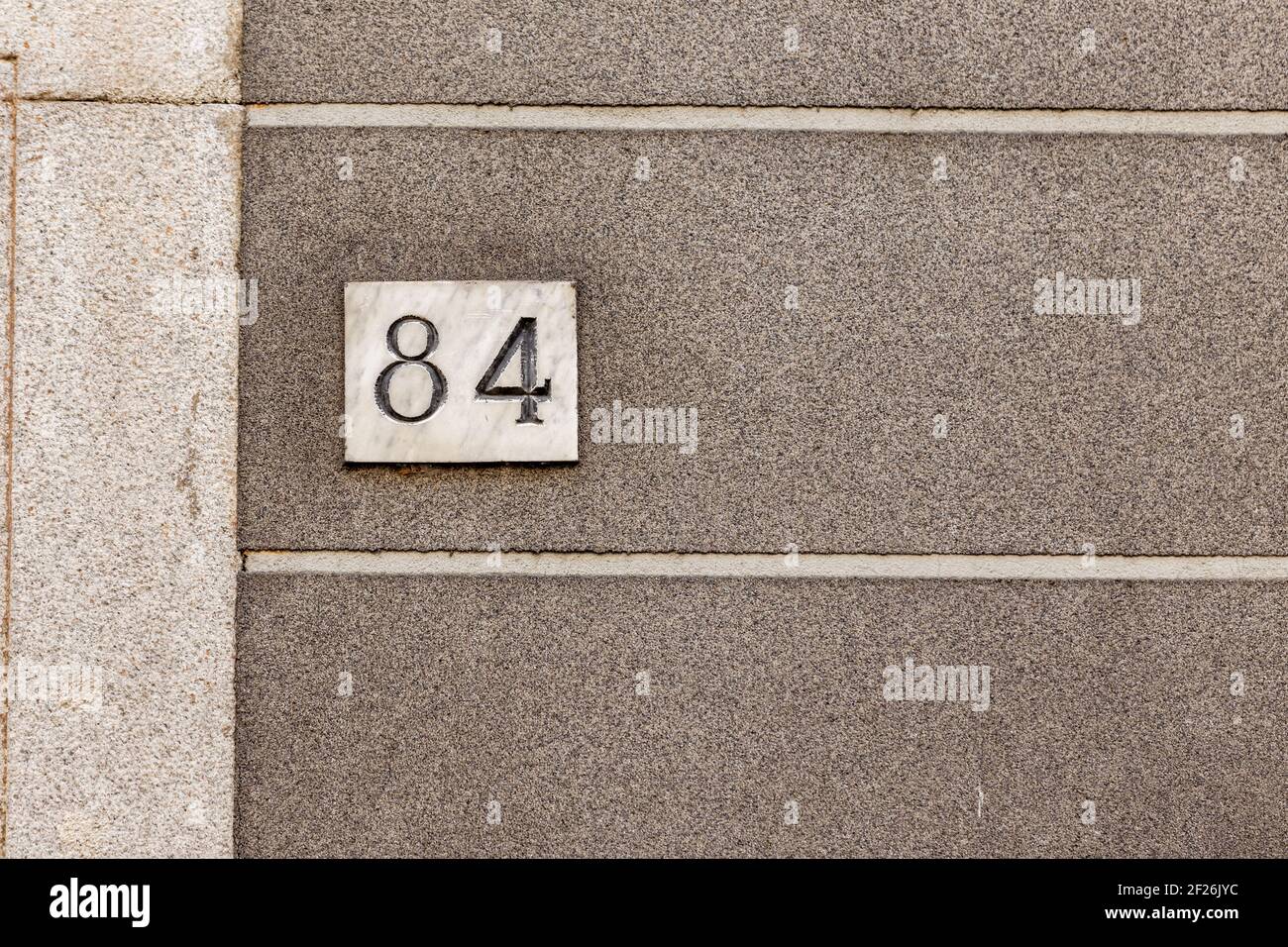 84 ancient house number, concept number Stock Photo - Alamy