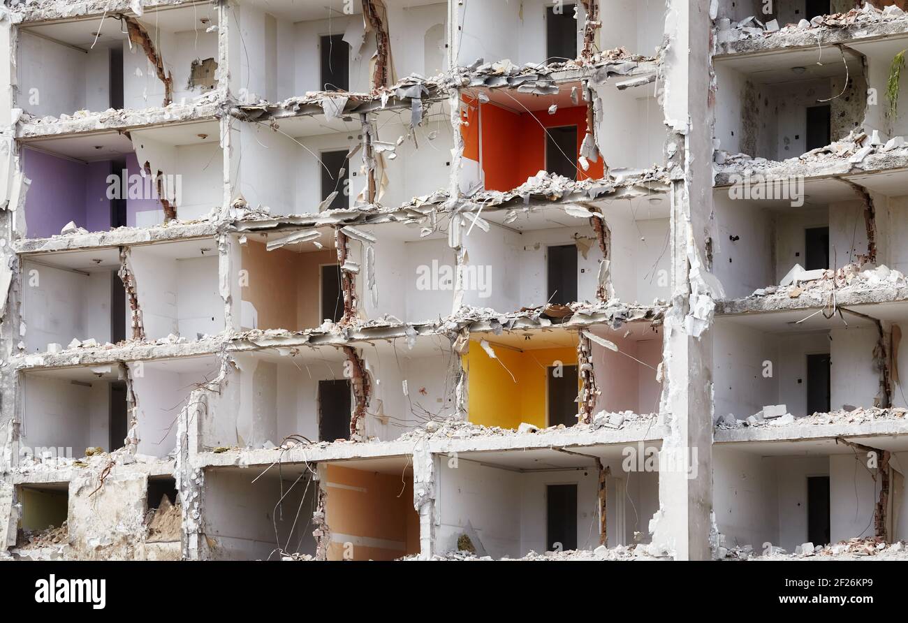 Destroyed apartment building without a front wall Stock Photo - Alamy