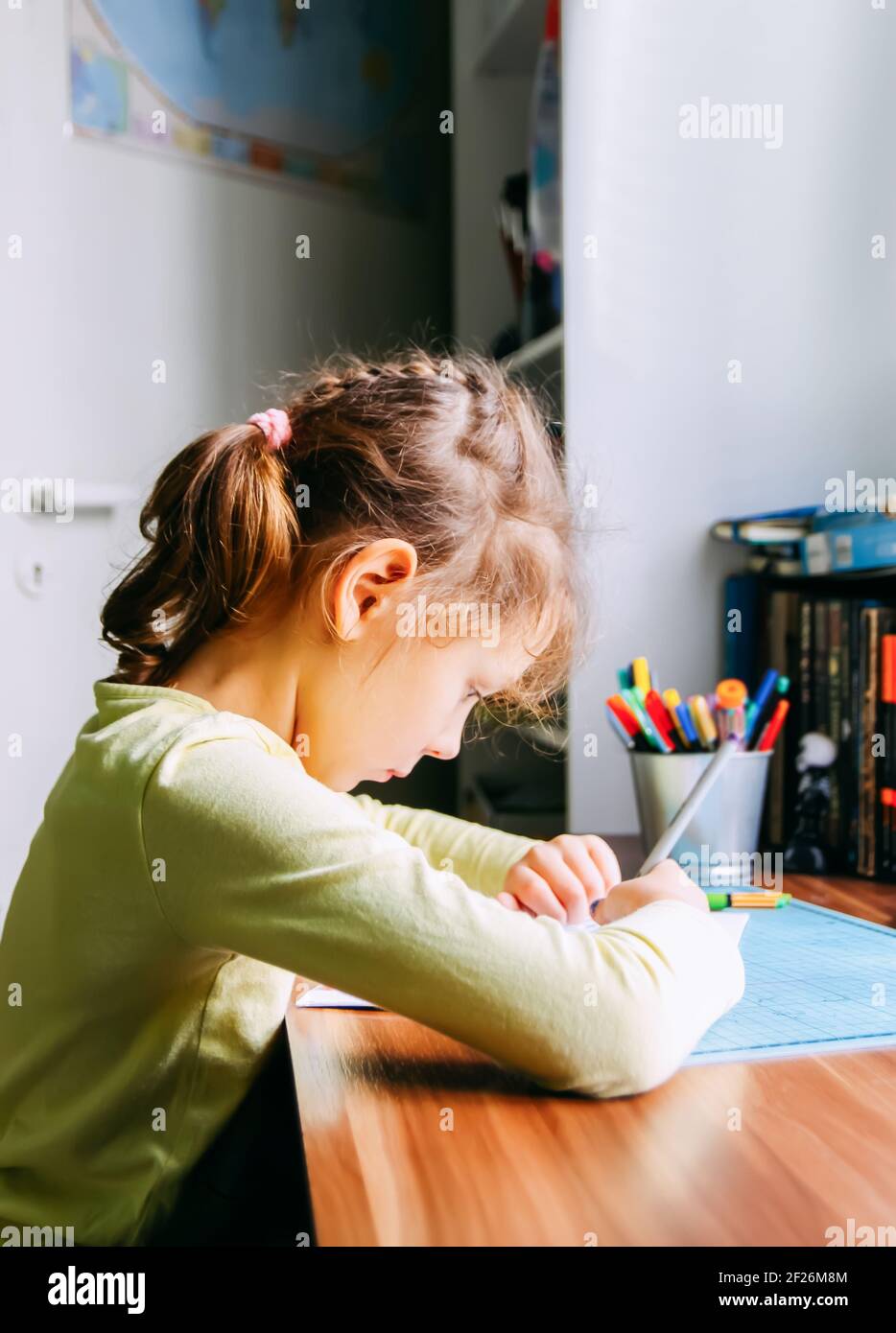 Happy caucasian girl home writing hi-res stock photography and images ...