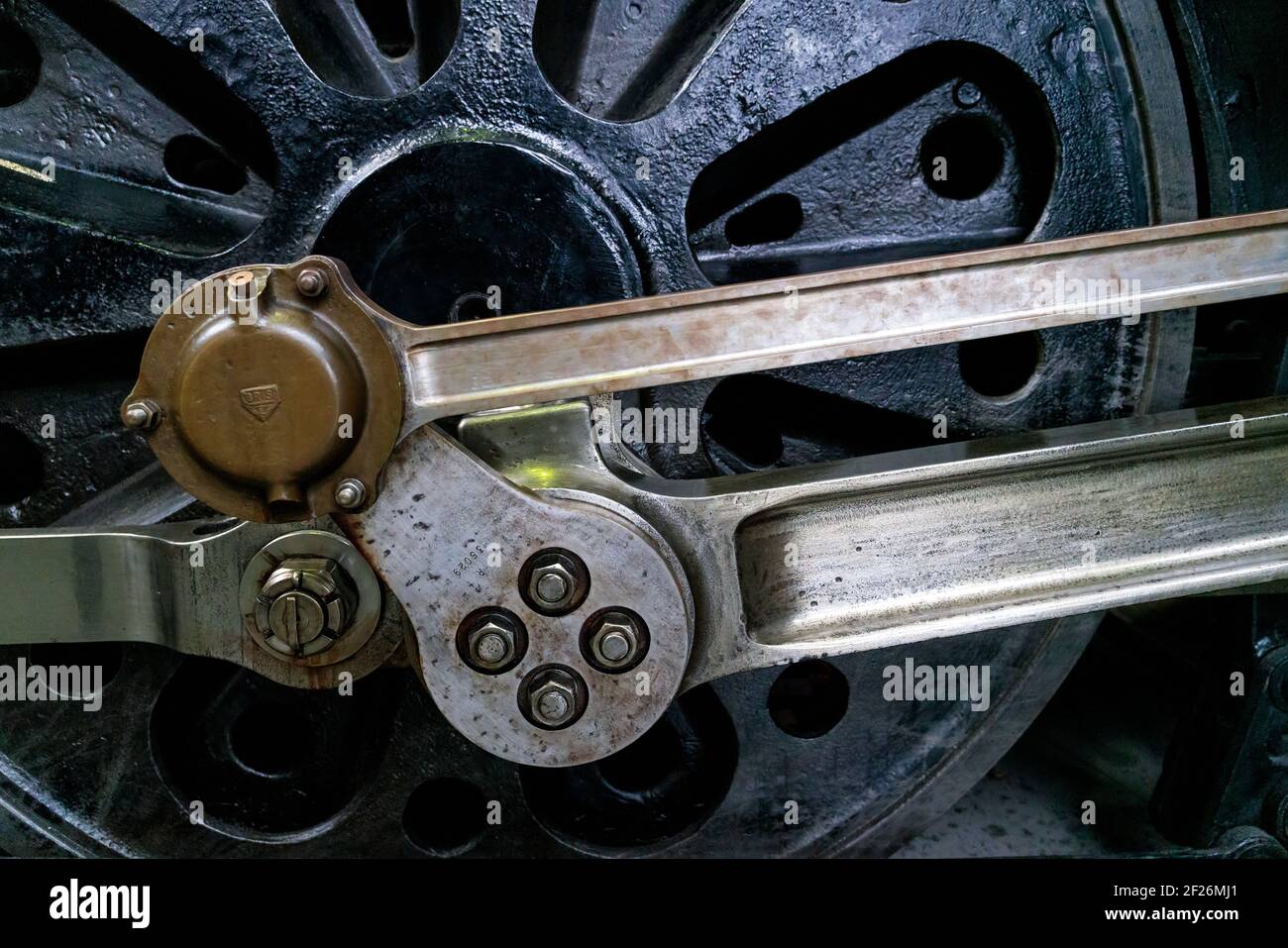 Detail of the linkage to a steam train wheel Stock Photo - Alamy