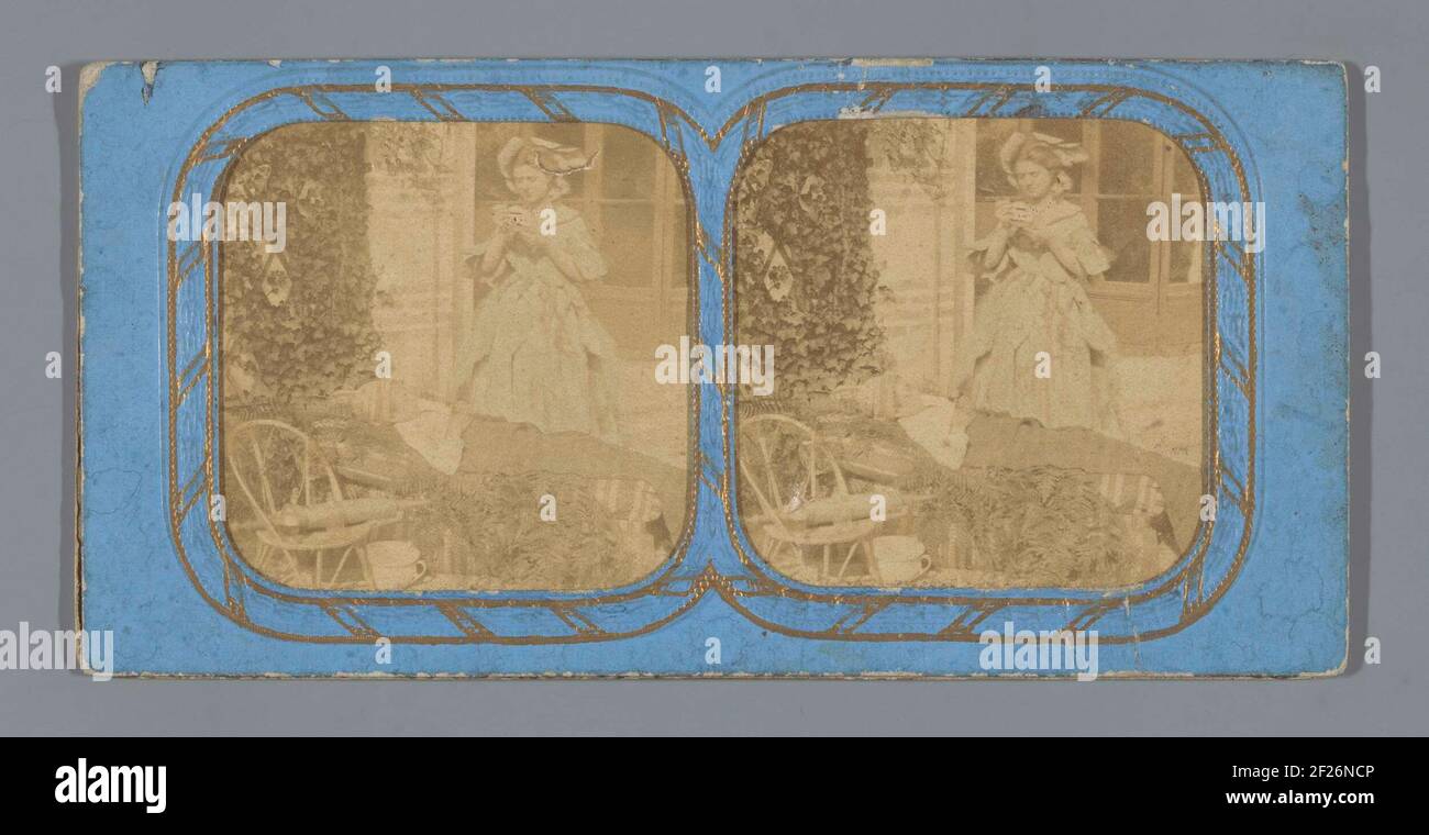 Outdoor scene: woman and child in bed in garden Stock Photo - Alamy