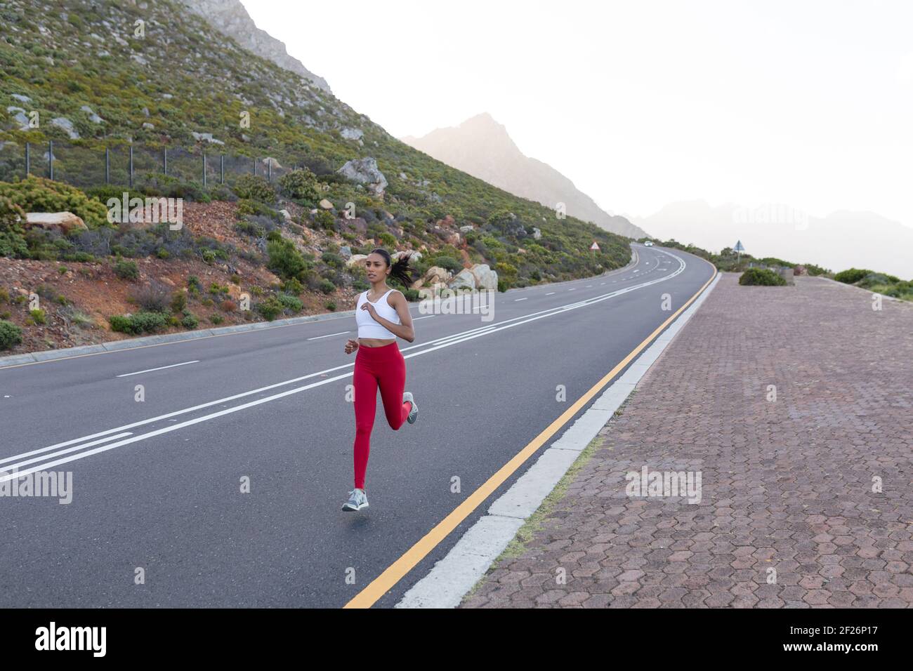 Running on coastal road person hi-res stock photography and images - Alamy