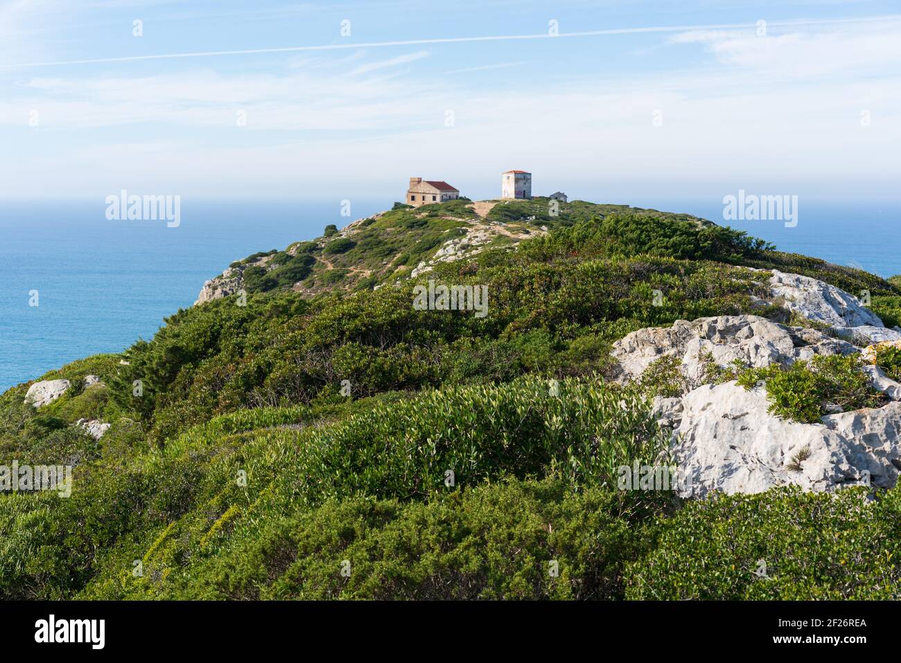 Ruin buildings in Cape Espichel landscape with atlantic ocean and cliffs, in Portugal Stock ...